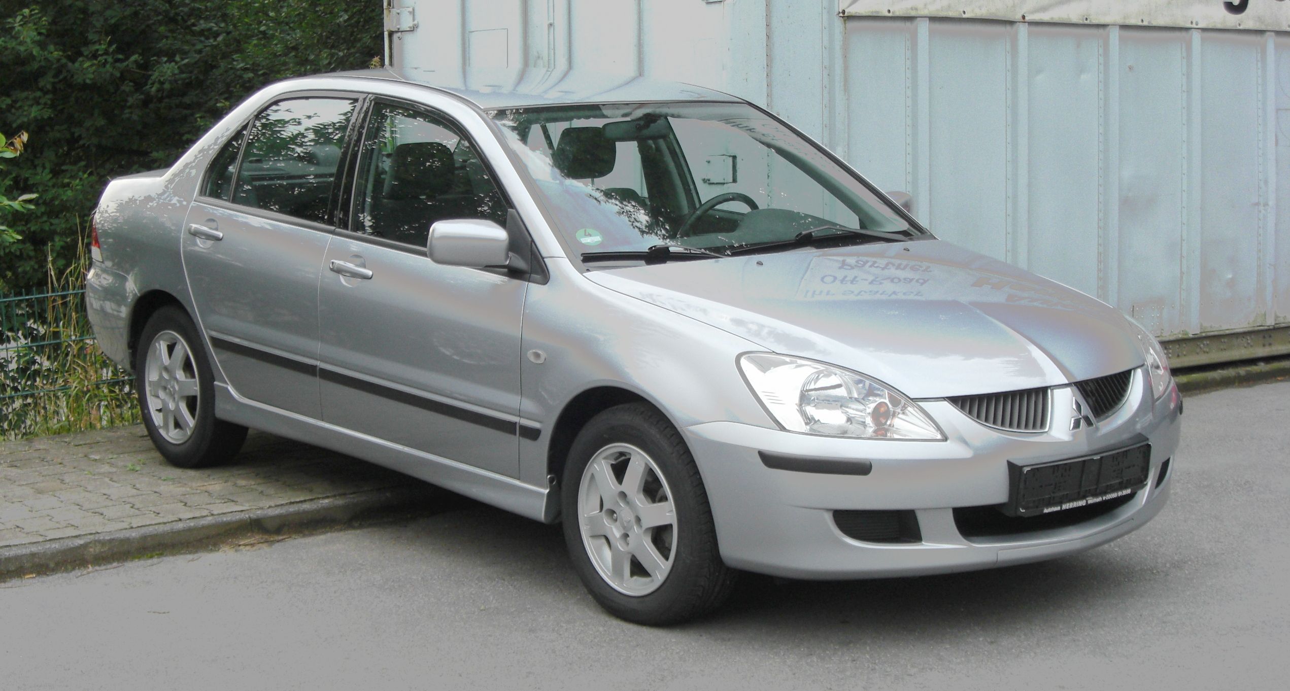 2003 Mitsubishi Lancer OZ Rally 0-60 Times, Top Speed, Specs, Quarter ...