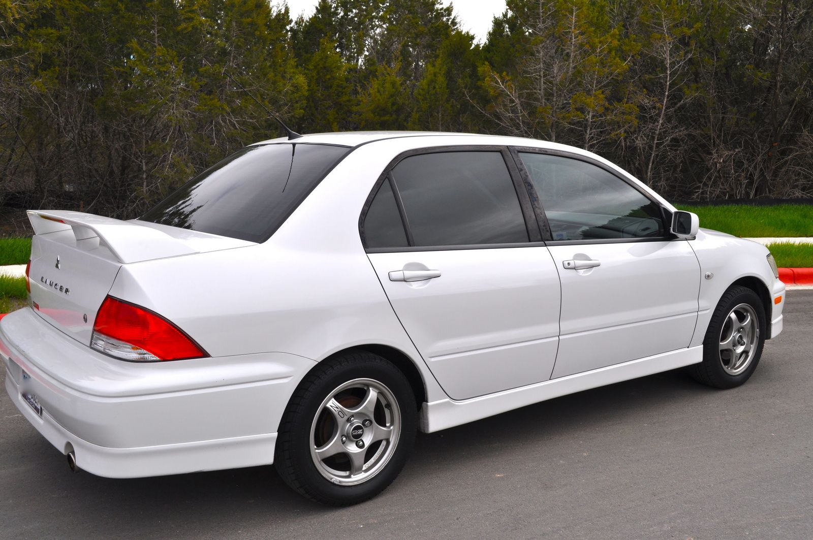 2003 Mitsubishi Lancer OZ Rally 0-60 Times, Top Speed, Specs, Quarter ...