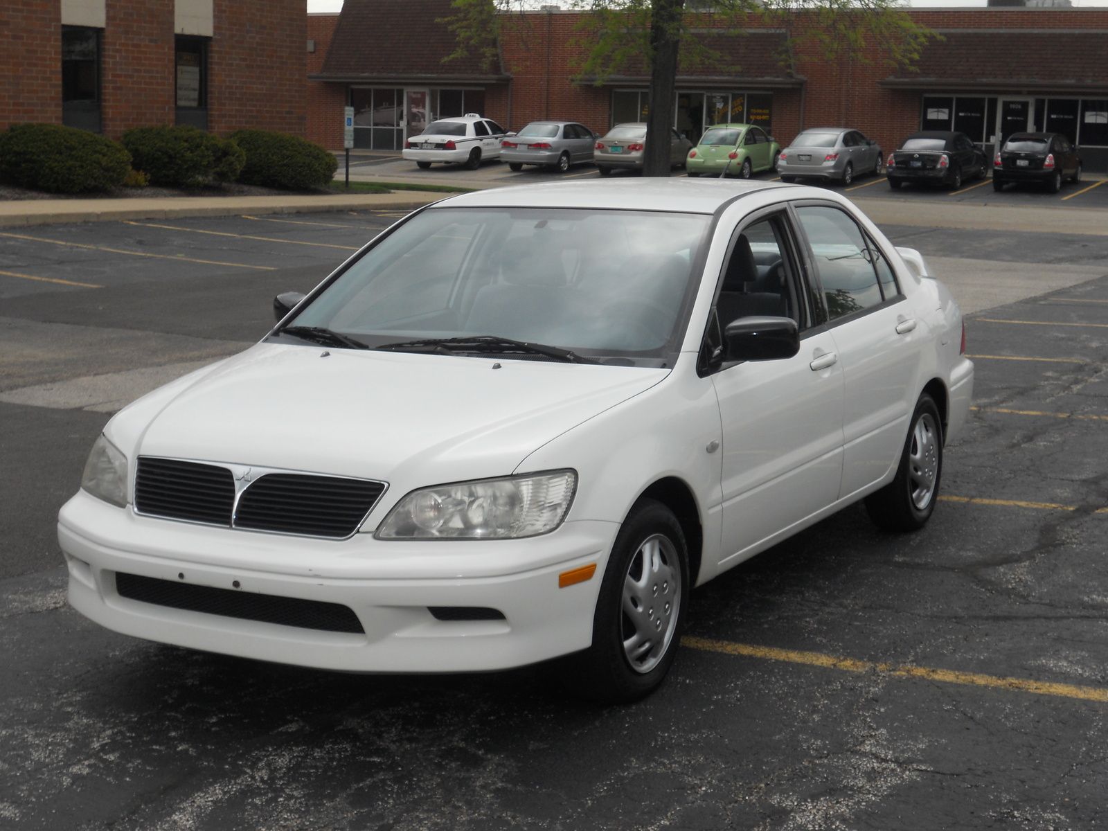 2003 Mitsubishi Lancer OZ Rally 0-60 Times, Top Speed, Specs, Quarter ...